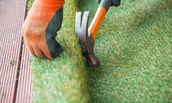 How to Install Fake Grass on Dirt - Ace Landscapes